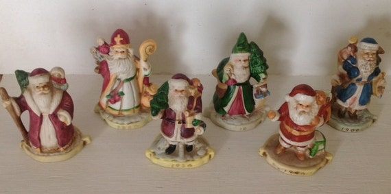 Vintage Santa Through the Years Figurines set of 6