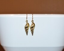 Popular items for conch earrings on Etsy