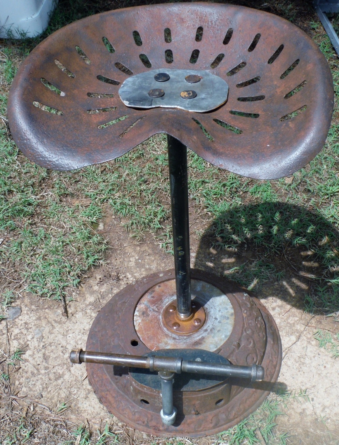 Repurposed Cast Iron Wood Stove Top With Tractor Seat For
