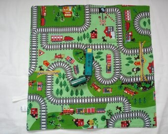 Hand-made fold away train track fabric play mat.