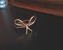 Popular items for gold bow ring on Etsy