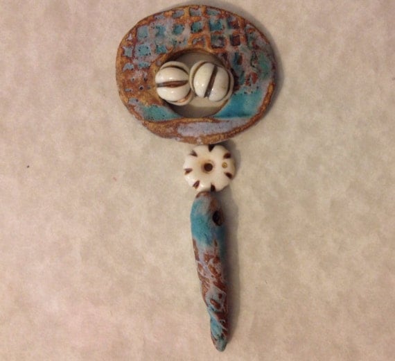 Items similar to Oval organic donut with spike and bone beads odd448 on ...