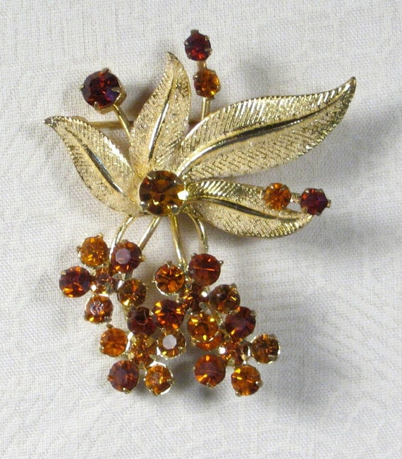 Vintage Brooch with Topaz Colored Stones Made in Austria