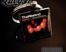 The Weeknd XO Echoes Of Silence 1.1 inch metal keychain by rUmPeLsTiLtSkIn