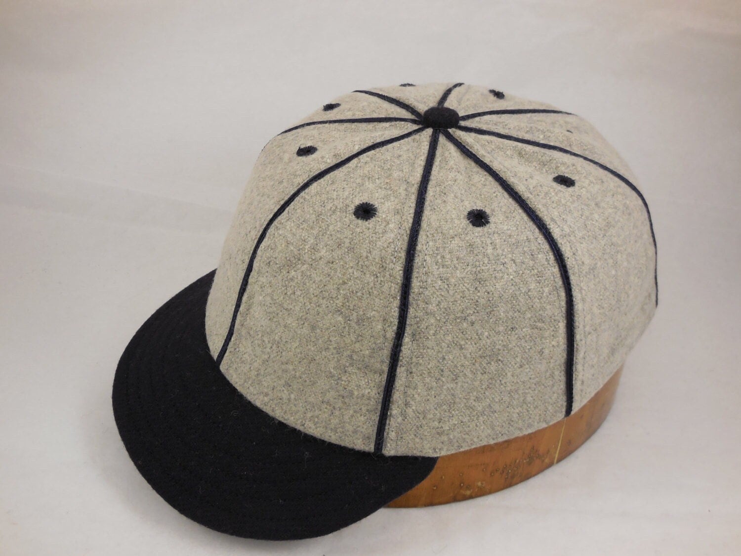 Light grey wool 8 panel baseball cap with navy soutache, eyelets and ...