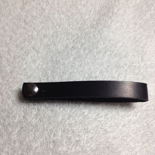 Leather acoustic guitar strap button holder