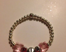Popular items for beaded name bracelet on Etsy