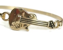 Unique guitar jewelry related items | Etsy