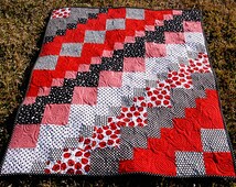 Popular items for ladybug baby quilt on Etsy