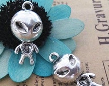 Popular items for alien charm on Etsy
