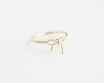 Popular items for gold bow ring on Etsy