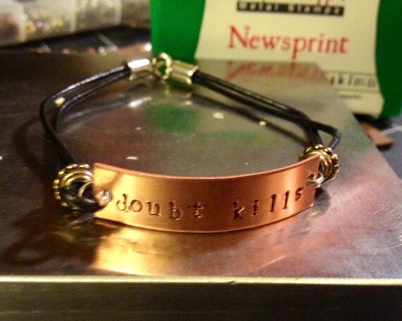 Items similar to Doubt kills copper plate/ cord bracelet on Etsy