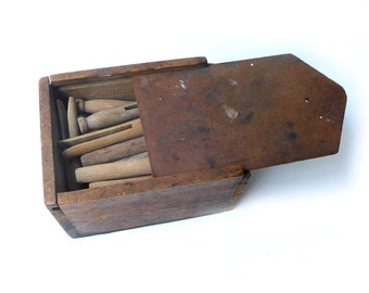 Vintage Mid century rustic wood box of wooden clothes pegs