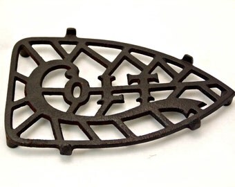 Popular items for antique trivet on Etsy
