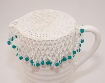 Popular items for jug cover on Etsy
