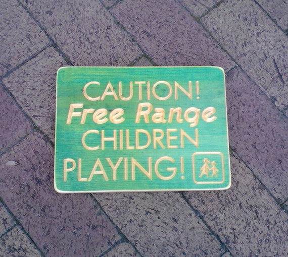 Items similar to Caution! Free Range Children Playing! Carved Sign on Etsy