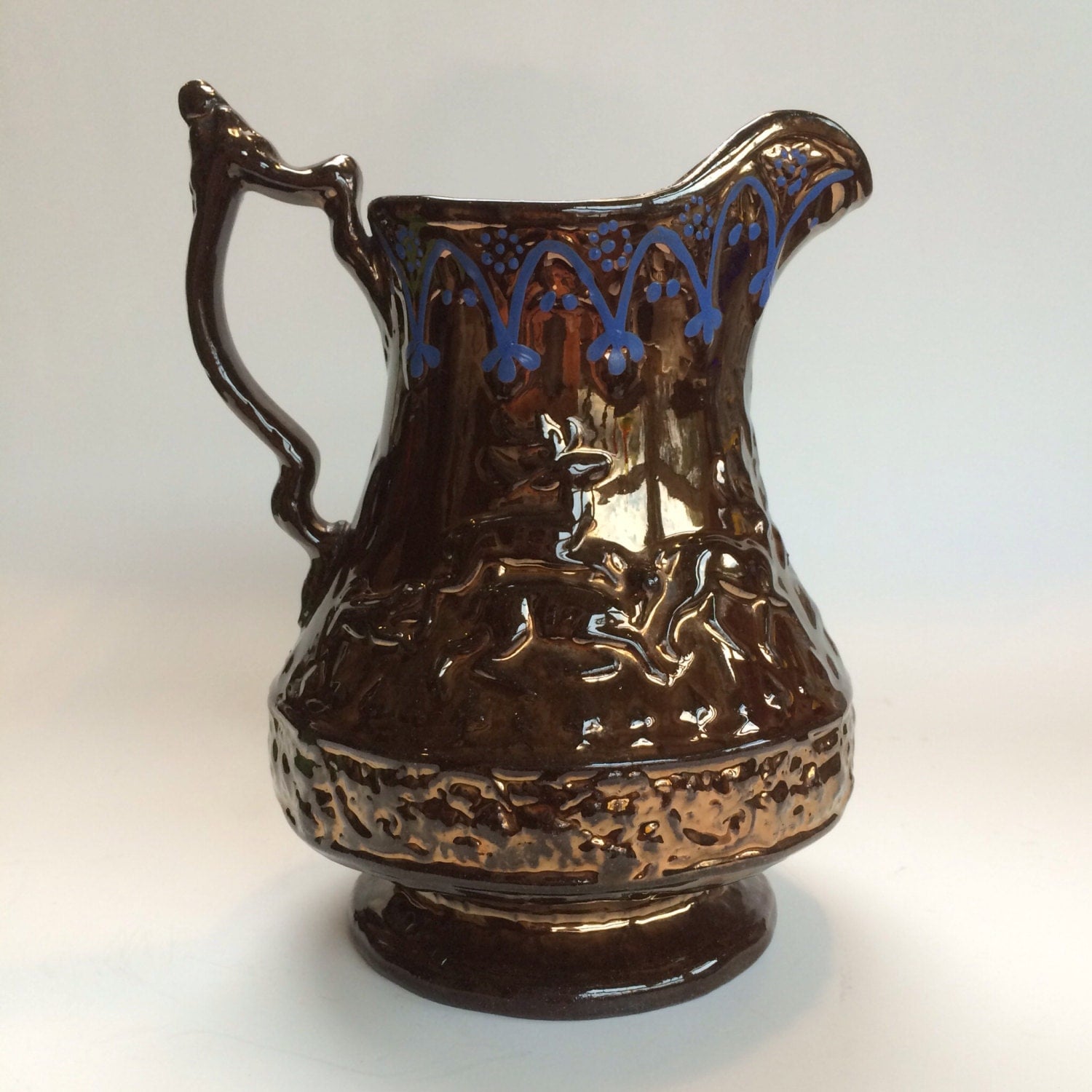 Heavily Textured Brown Glazed Pottery Pitcher with Blue Accents – Haute ...