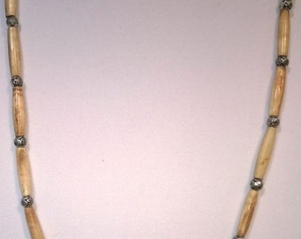 Items similar to Handmade Bone Bolo BEAVER on Black Cord Bone Tips on Etsy