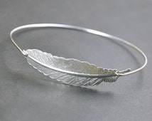 Unique feather bracelet related items | Etsy