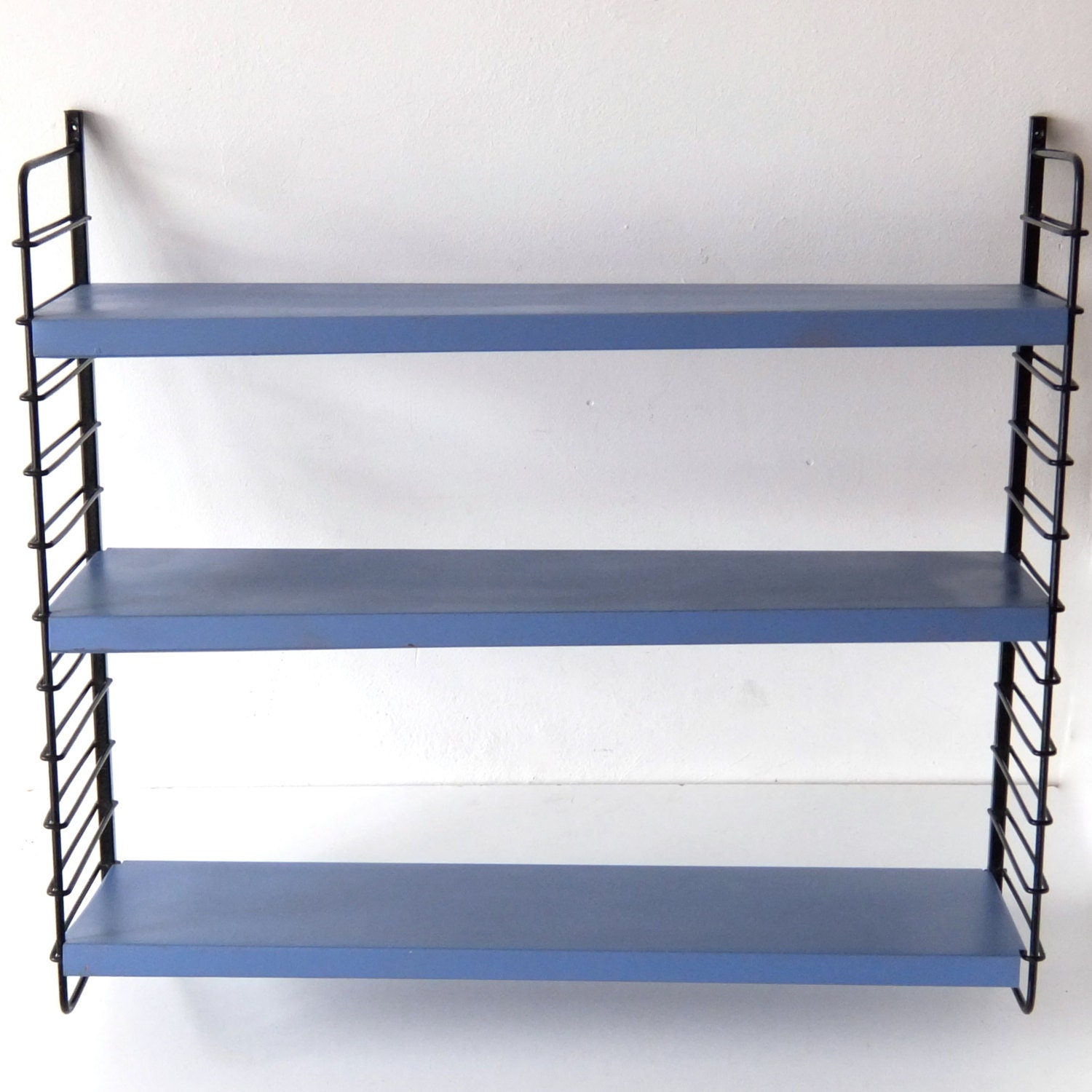 Tomado style shelf system – Haute Juice