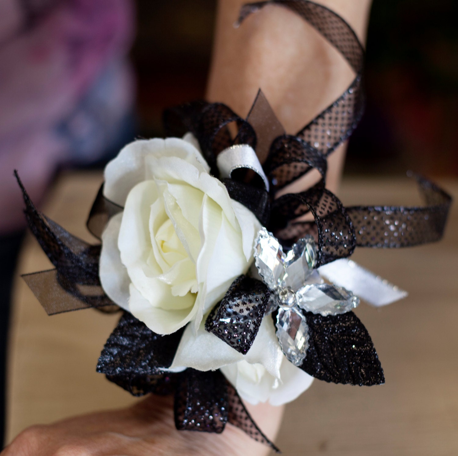 White Rose Black Ribbon Silver Leaf Wrist Corsage with
