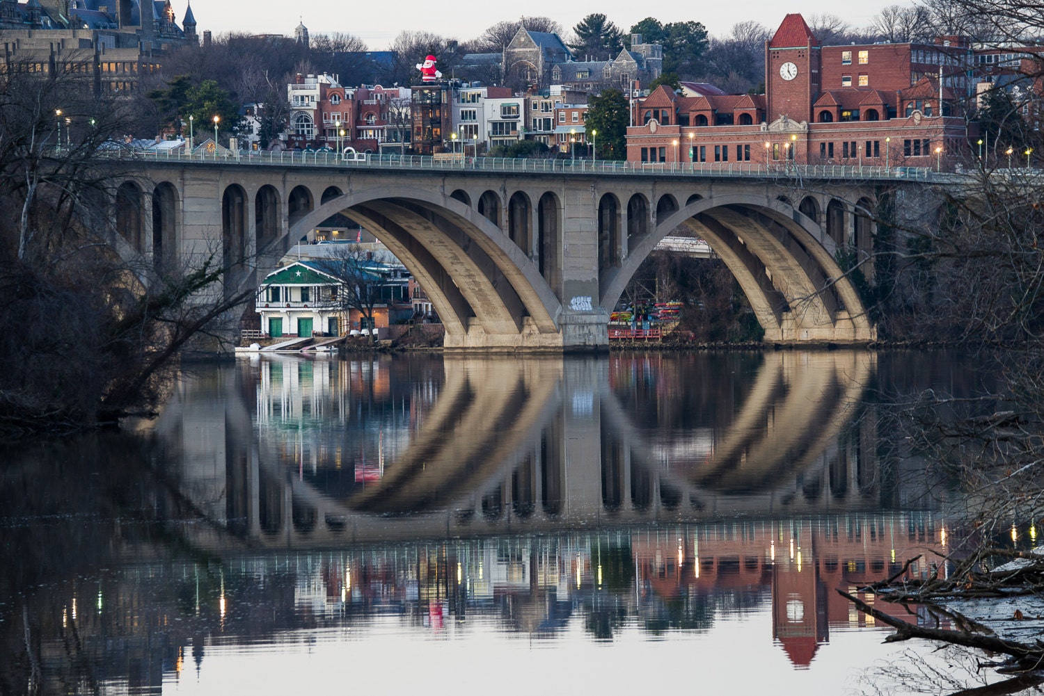 Keyhole The Key Bridge in Georgetown is Reflected in Evening