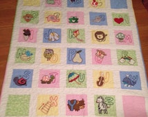 Popular items for baby girl quilts on Etsy