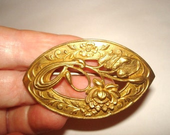 Repousse brooch | Etsy