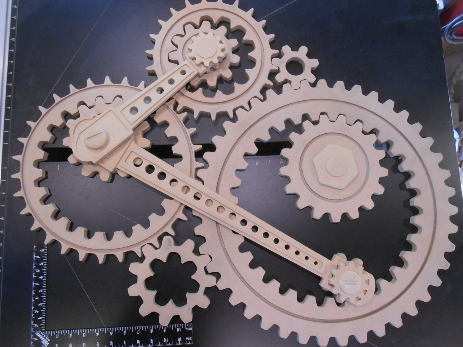 Wooden Gear Sculpture in Progress: 9 large wood gears 2