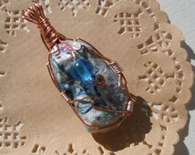 Popular items for wire wrapped marbles on Etsy