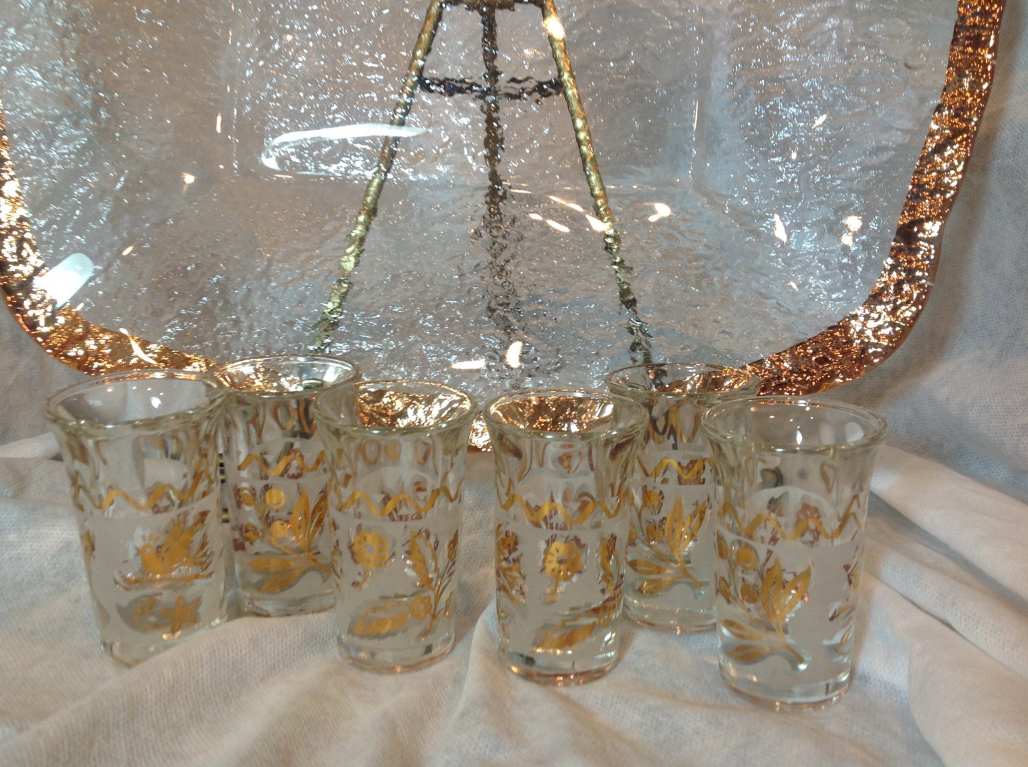 Eames-era, Retro Barware set six shot glasses gold embossed one glass ...