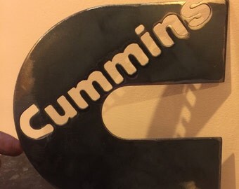Metal cummins sign