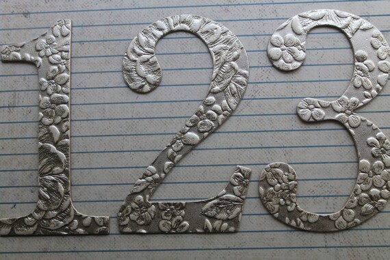 Numbers 1-12 silver/white embossed raised design floral