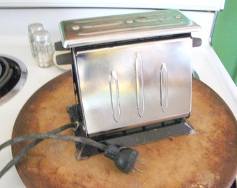 Early flopper electric toaster