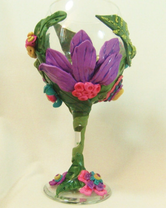 Items similar to Funky spring flowers wine glass on Etsy