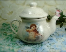 Popular items for angel teapot on Etsy