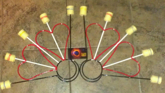 Pair of Heartburn handmade fire fans