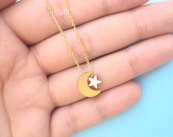 Diamond and white gold crescent moon necklace with diamond