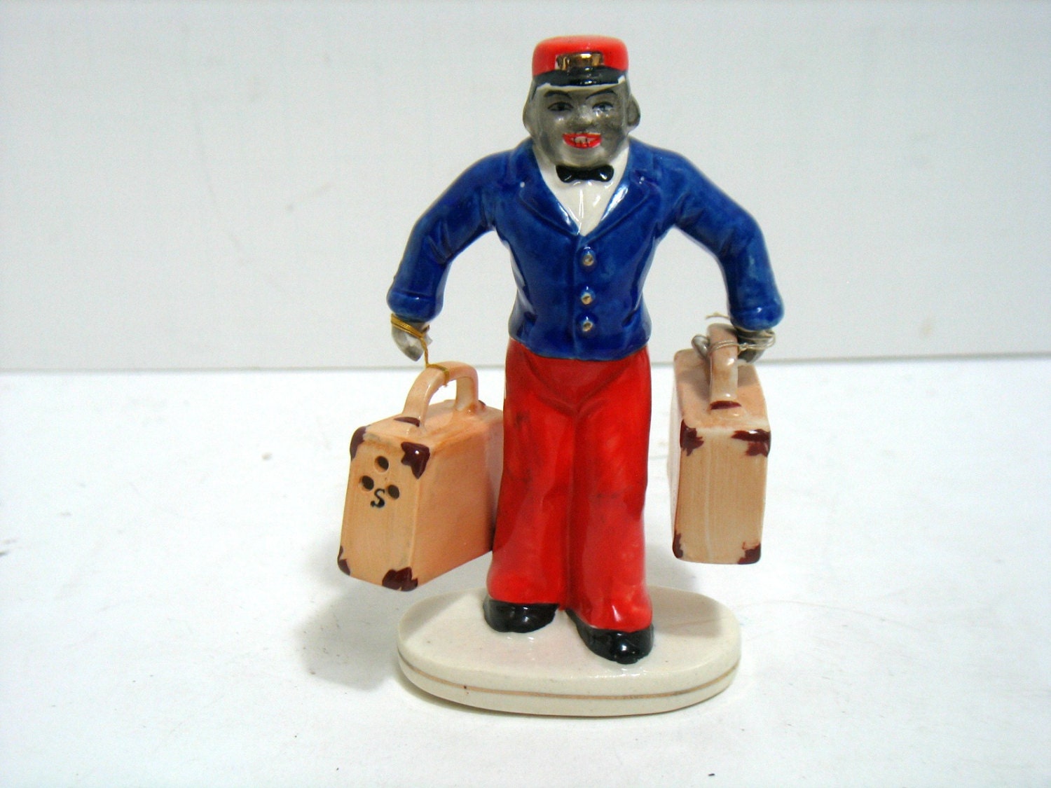 Vintage Black Americana Porter Bell hop Salt & by That70sShoppe