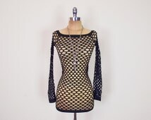 Popular items for fishnet dress on Etsy