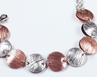 Handcrafted metal jewelry by metalandmaille on Etsy