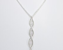 Popular items for dna pendant on Etsy