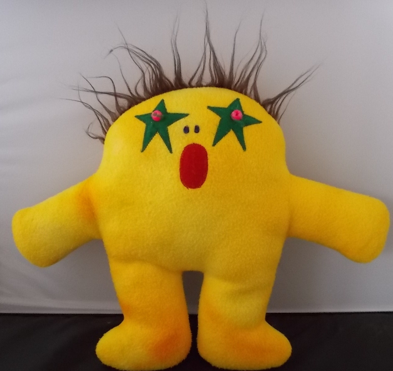 Plush Yellow Alien Monster Creature with Green Star Eyes
