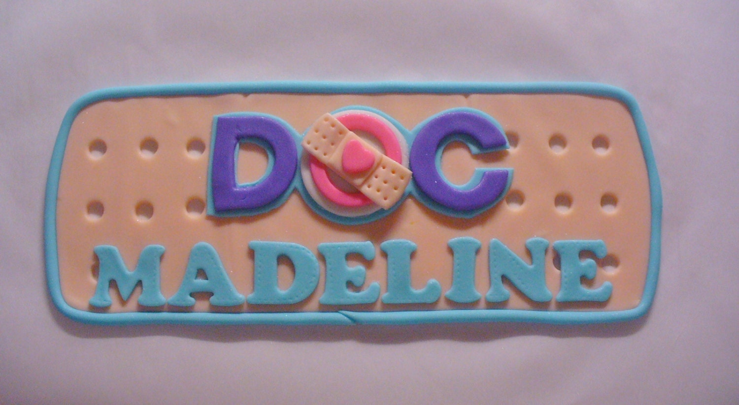 Doc Mcstuffins Band Aid Logo