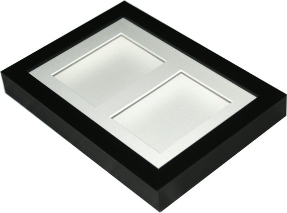 Twin 3x4 inch black display frame. Deep shadow box display