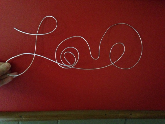Items similar to Love wire writing wall hanging on Etsy