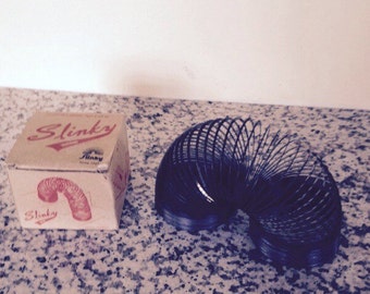 Popular items for slinky toy on Etsy