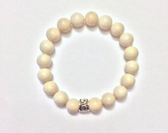 Items similar to Amber Cracked Glass Stretch Bracelet, Ivory Color ...