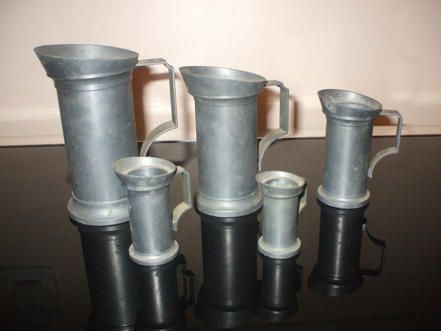five French pewter measuring tankards – Haute Juice