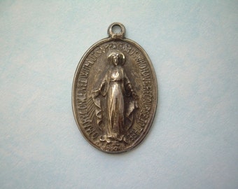 1830 religious medal on Etsy, a global handmade and vintage marketplace.